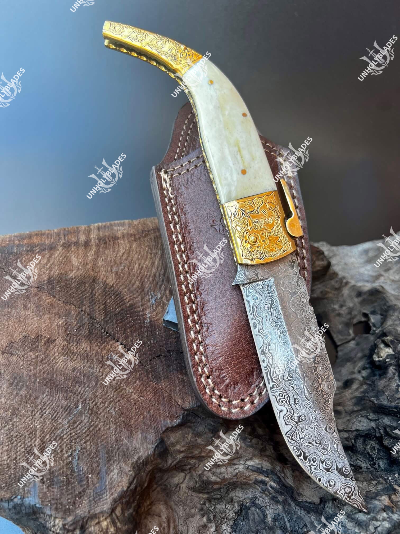 Damascus Steel Folding Knife with Camel Bone